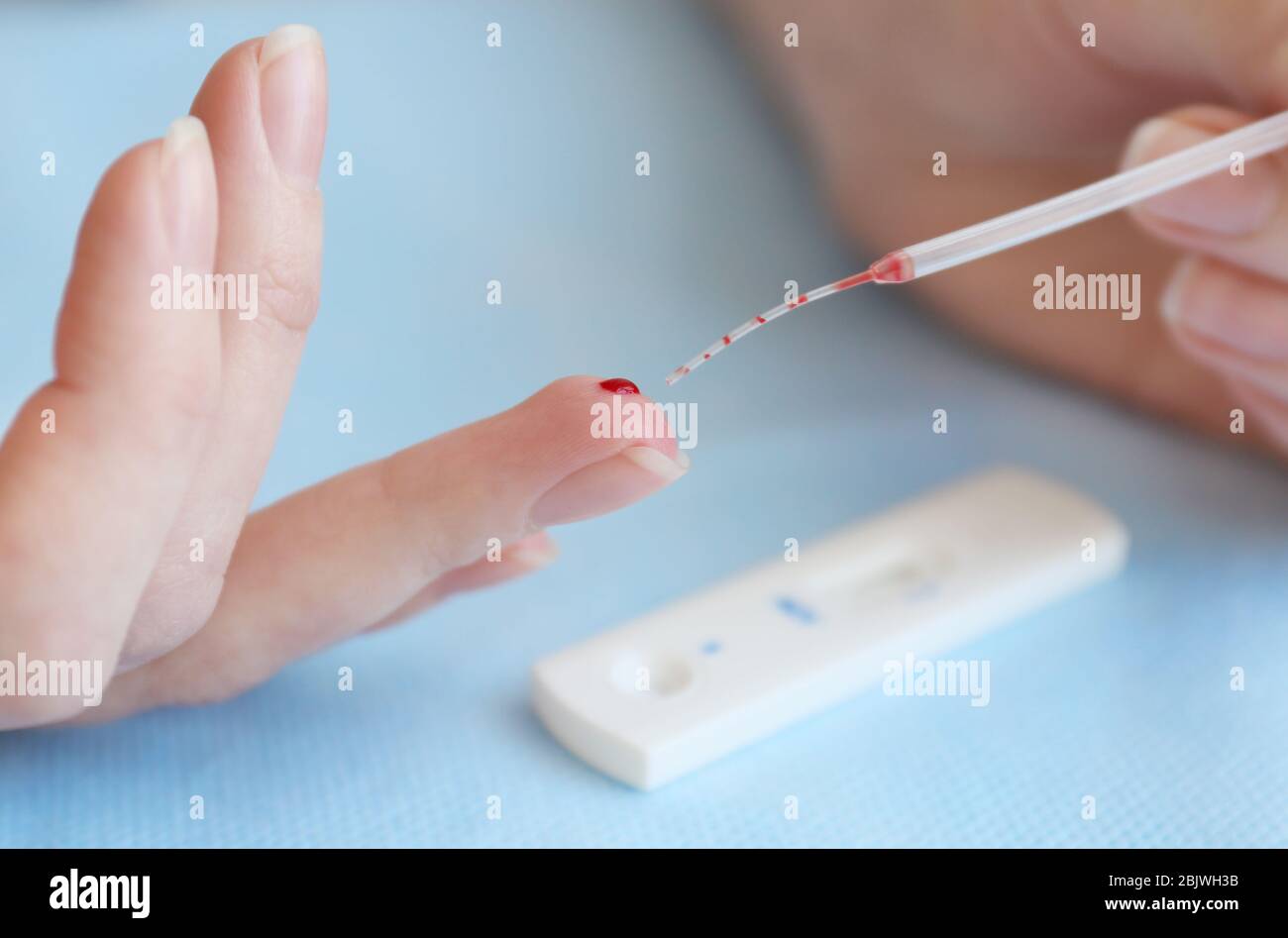 Woman taking blood sample for test, closeup Stock Photo - Alamy