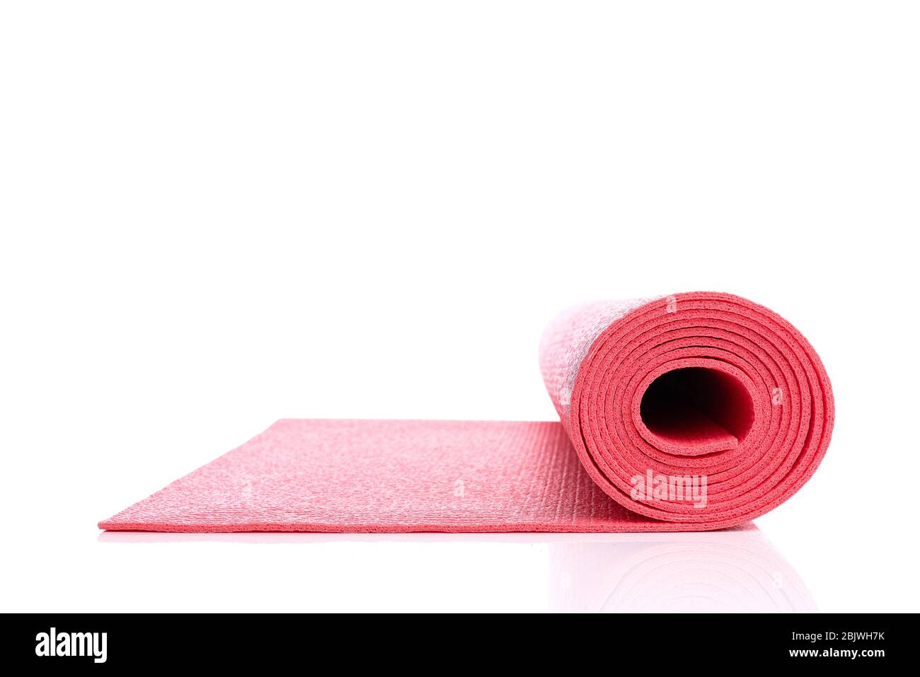Side view of red open yoga mat for exercise, isolated on white ...