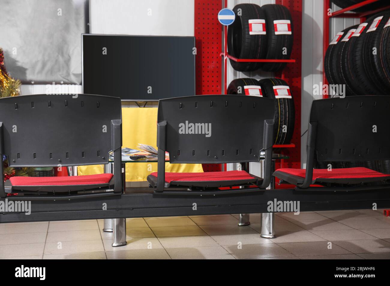 Modern tire store interior Stock Photo - Alamy