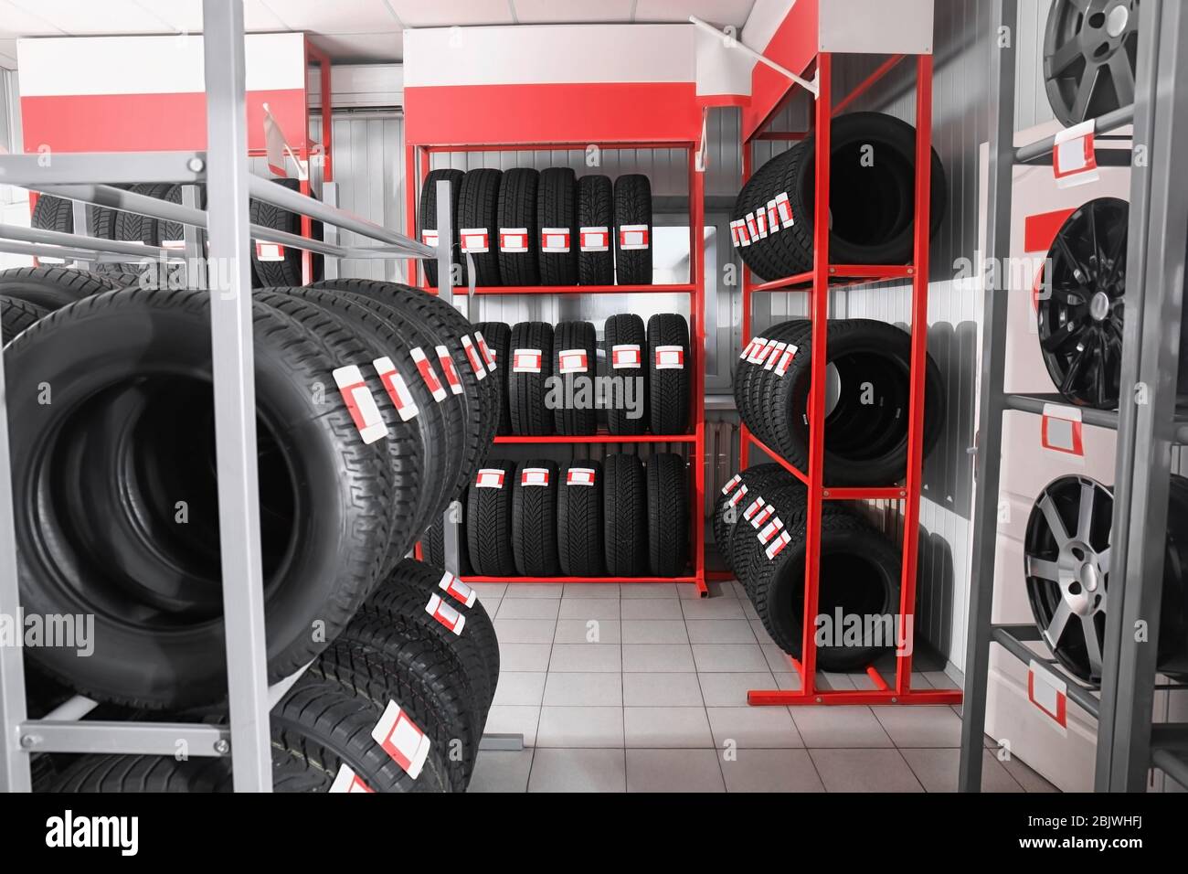 Modern tire store interior Stock Photo - Alamy