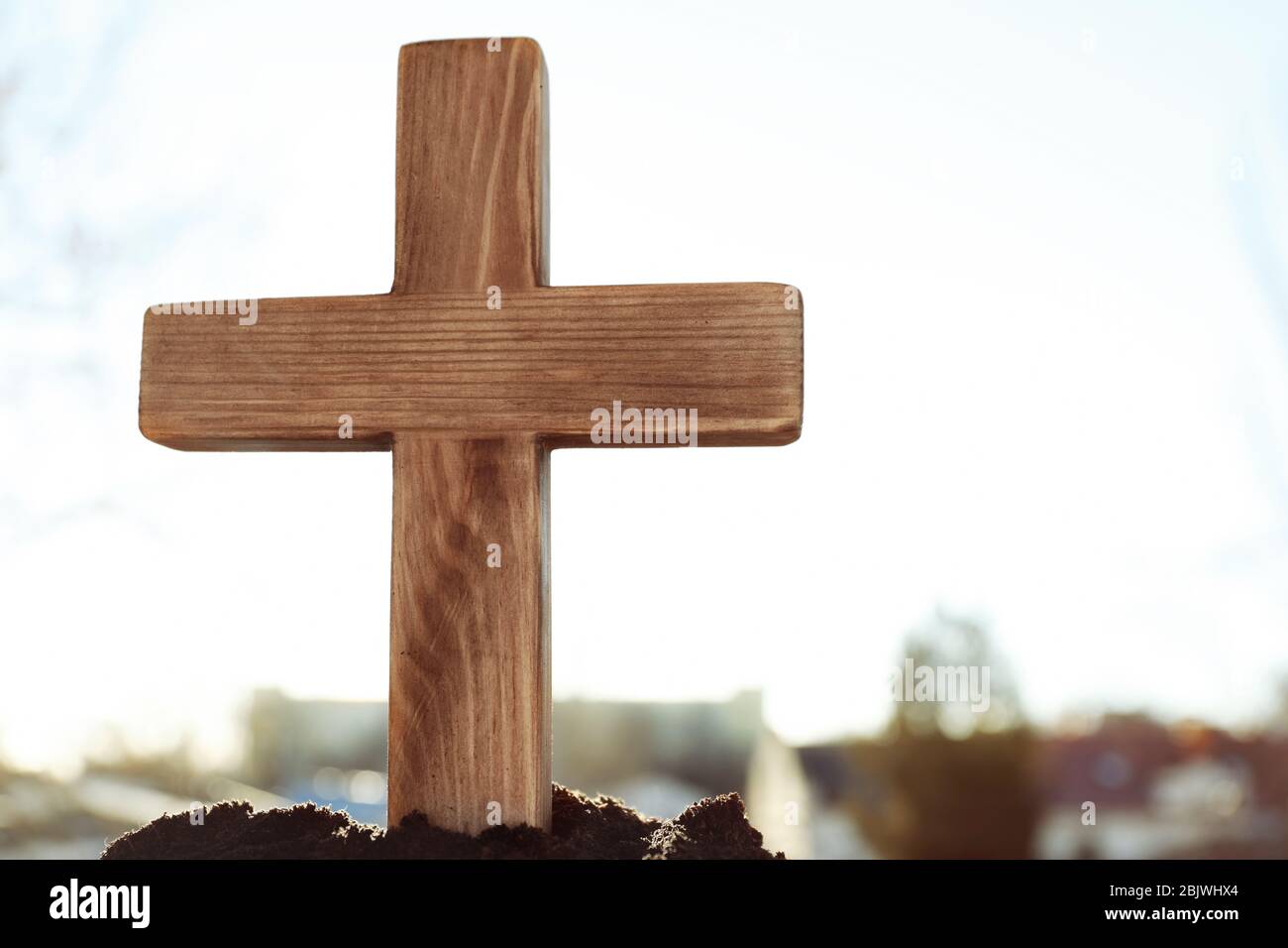 Wooden cemetery cross on sky background Stock Photo - Alamy