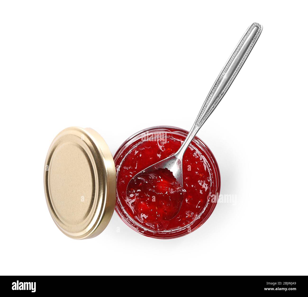 Jar and spoon with sweet jam on white background Stock Photo - Alamy