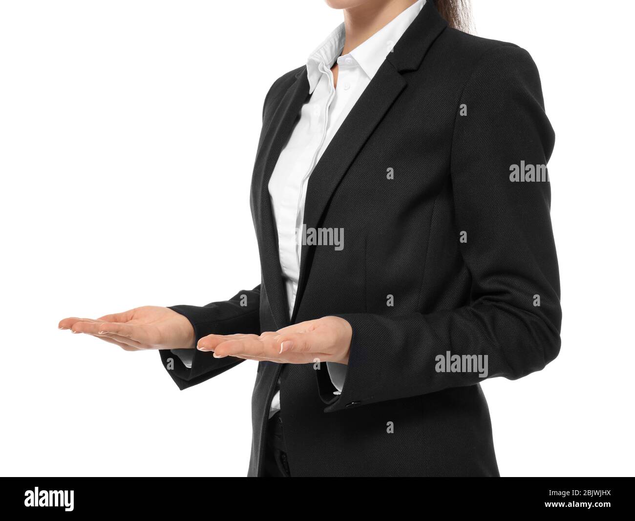 Young businesswoman showing balance gesture on white background Stock ...