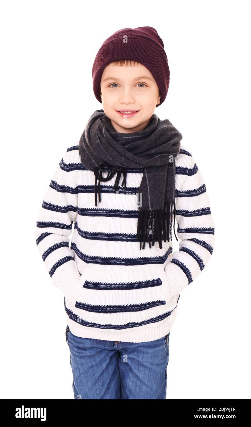 Cute little boy in warm clothing on white background. Ready for winter ...