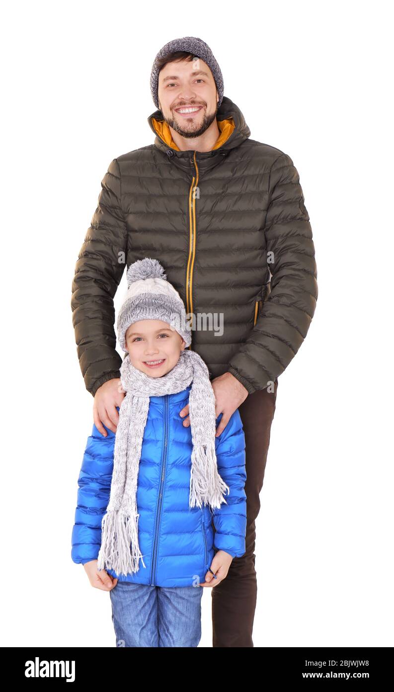 Cute little boy with father in warm clothing on white background. Ready ...