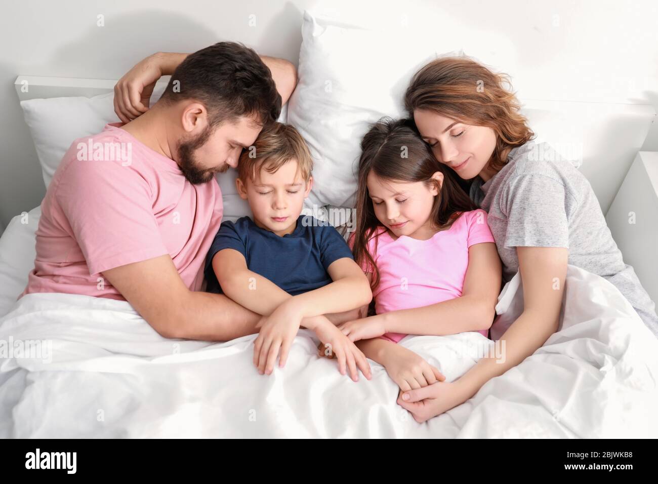 Children sleeping in bed hi-res stock photography and images - Alamy