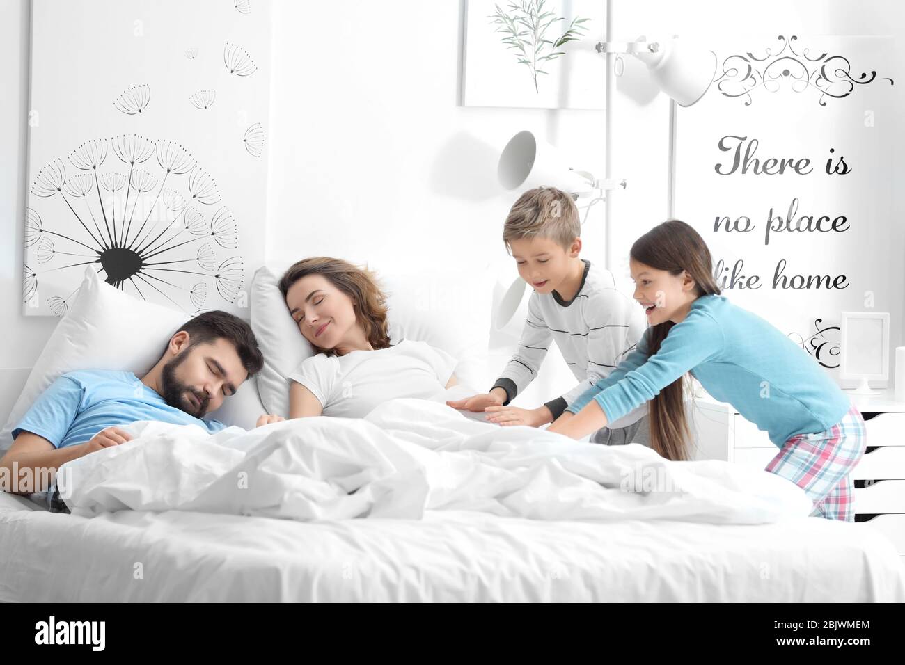 Kids waking up parents hi-res stock photography and images - Alamy