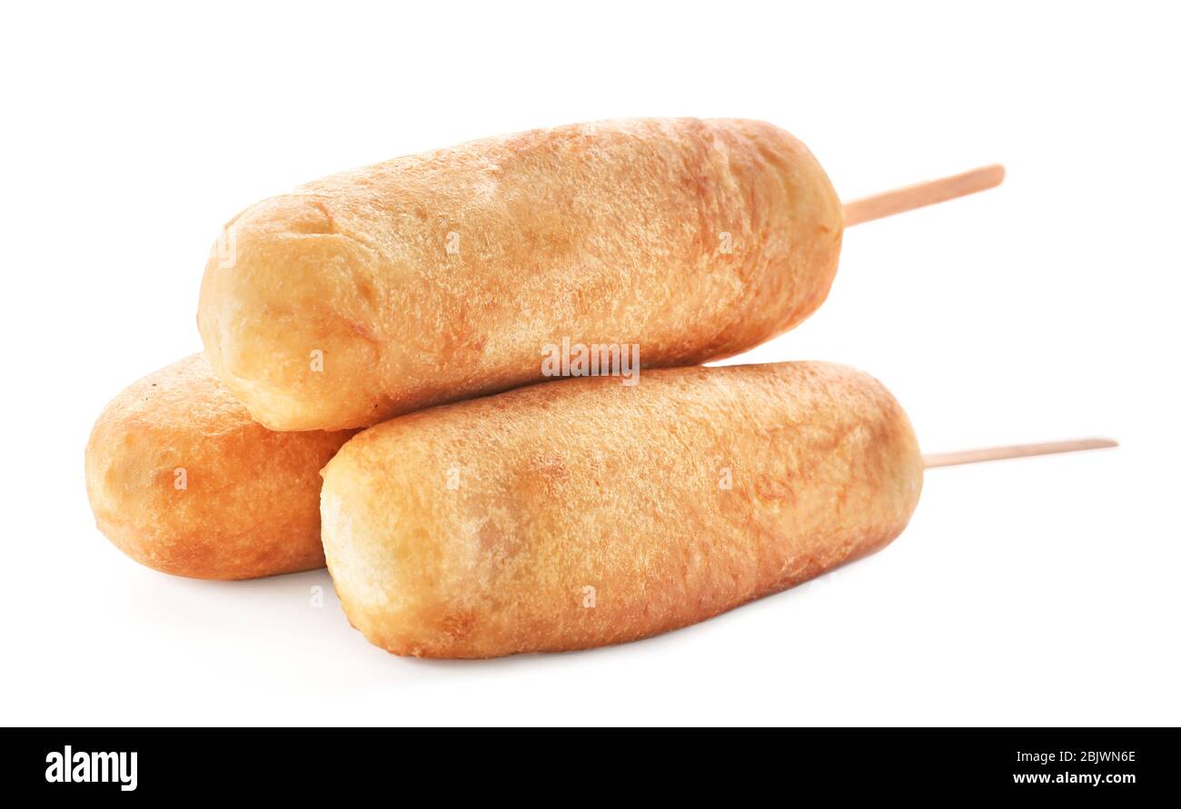 Tasty corn dogs on white background Stock Photo - Alamy