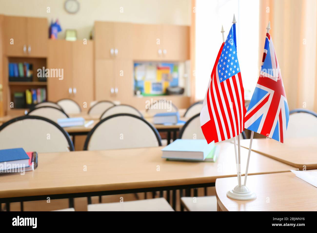 School classroom interior with flags on table Stock Photo - Alamy