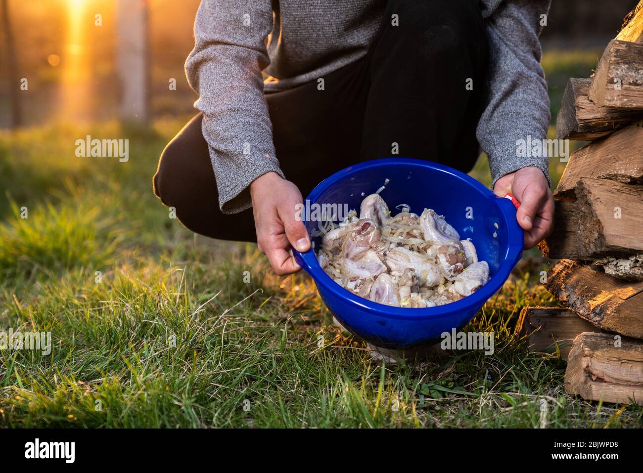 Man cooking roast chicken hi-res stock photography and images - Alamy