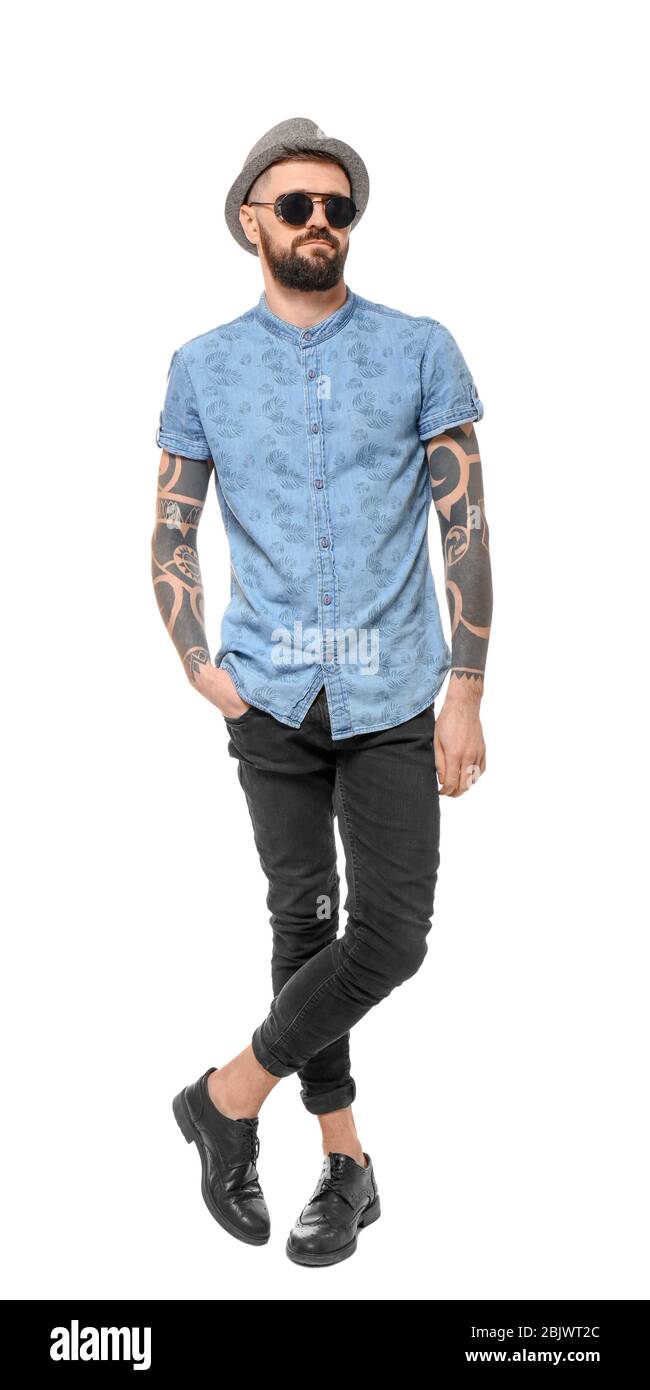 Portrait of handsome hipster in stylish outfit on white background ...