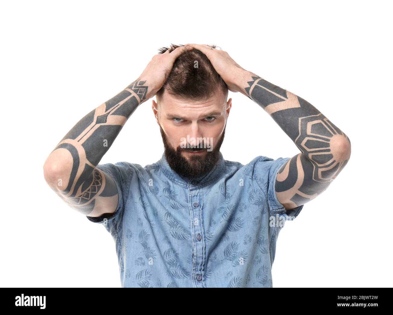 Portrait of handsome hipster in stylish outfit on white background ...