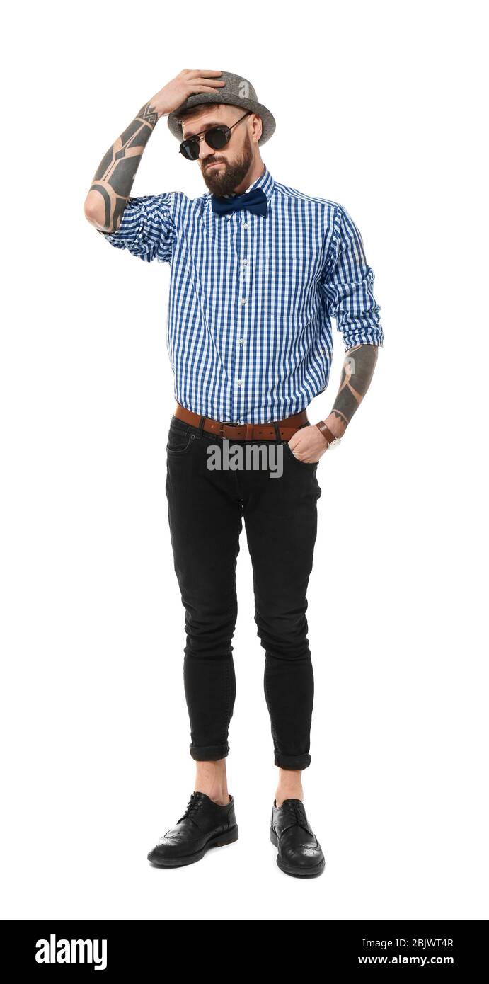 Portrait of handsome hipster in stylish outfit on white background ...