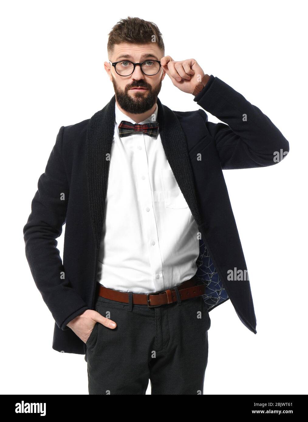 Portrait of handsome hipster in stylish outfit on white background ...