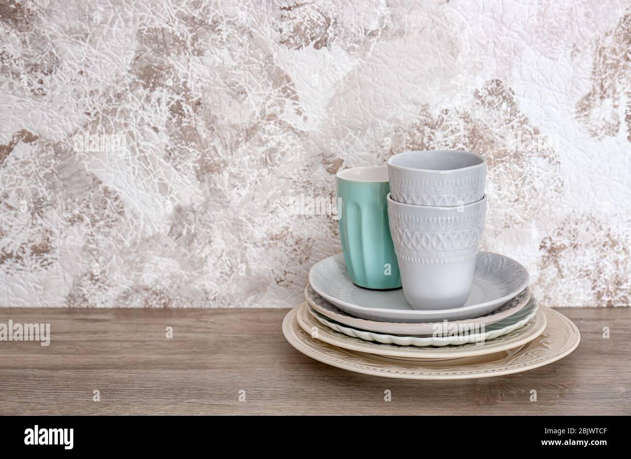 Set of dishware on table Stock Photo - Alamy