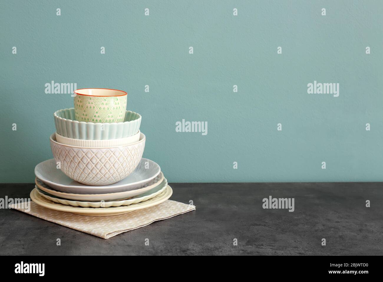 Set of dishware on table Stock Photo - Alamy