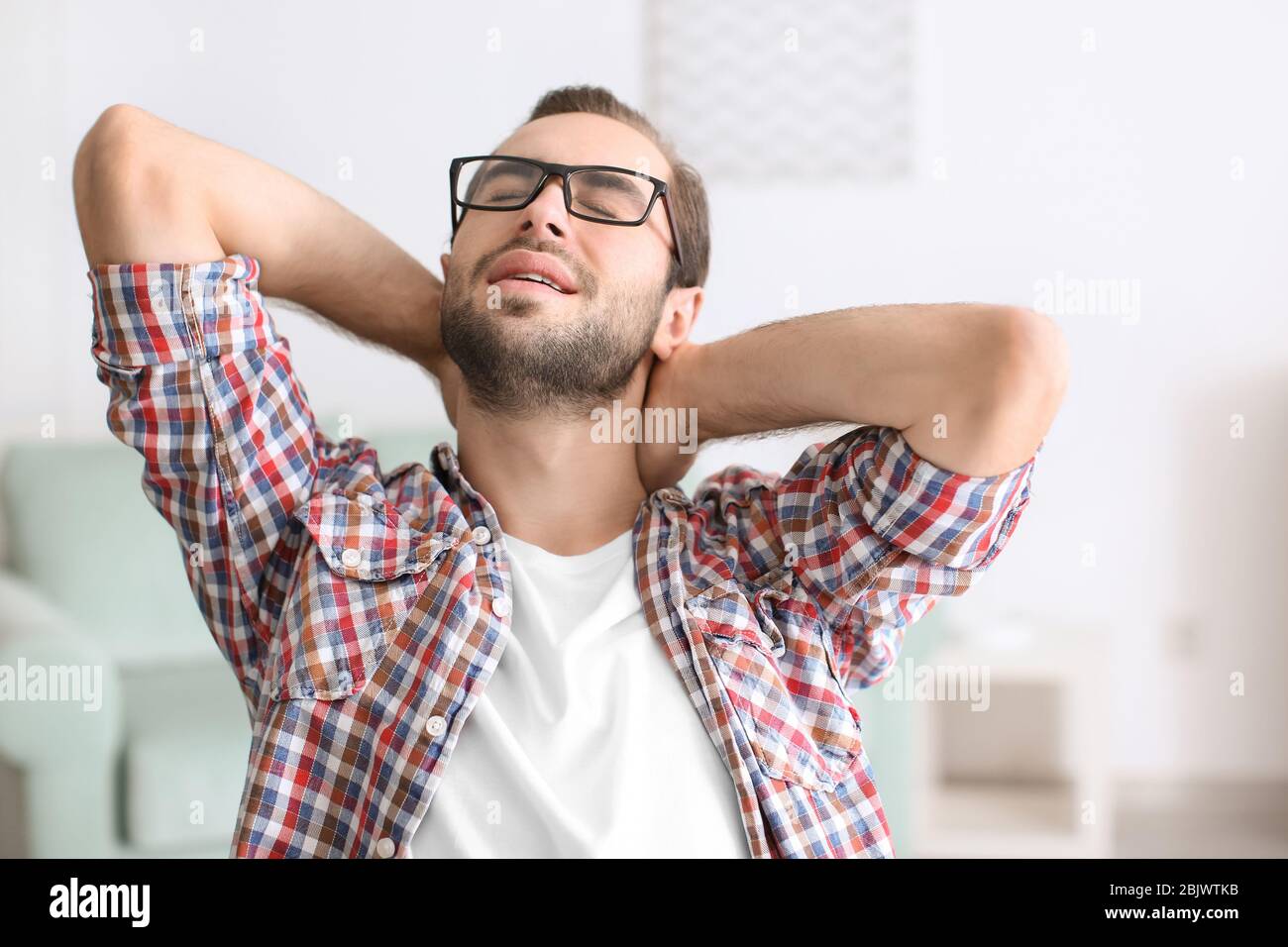 Student resting after studying at home Stock Photo - Alamy