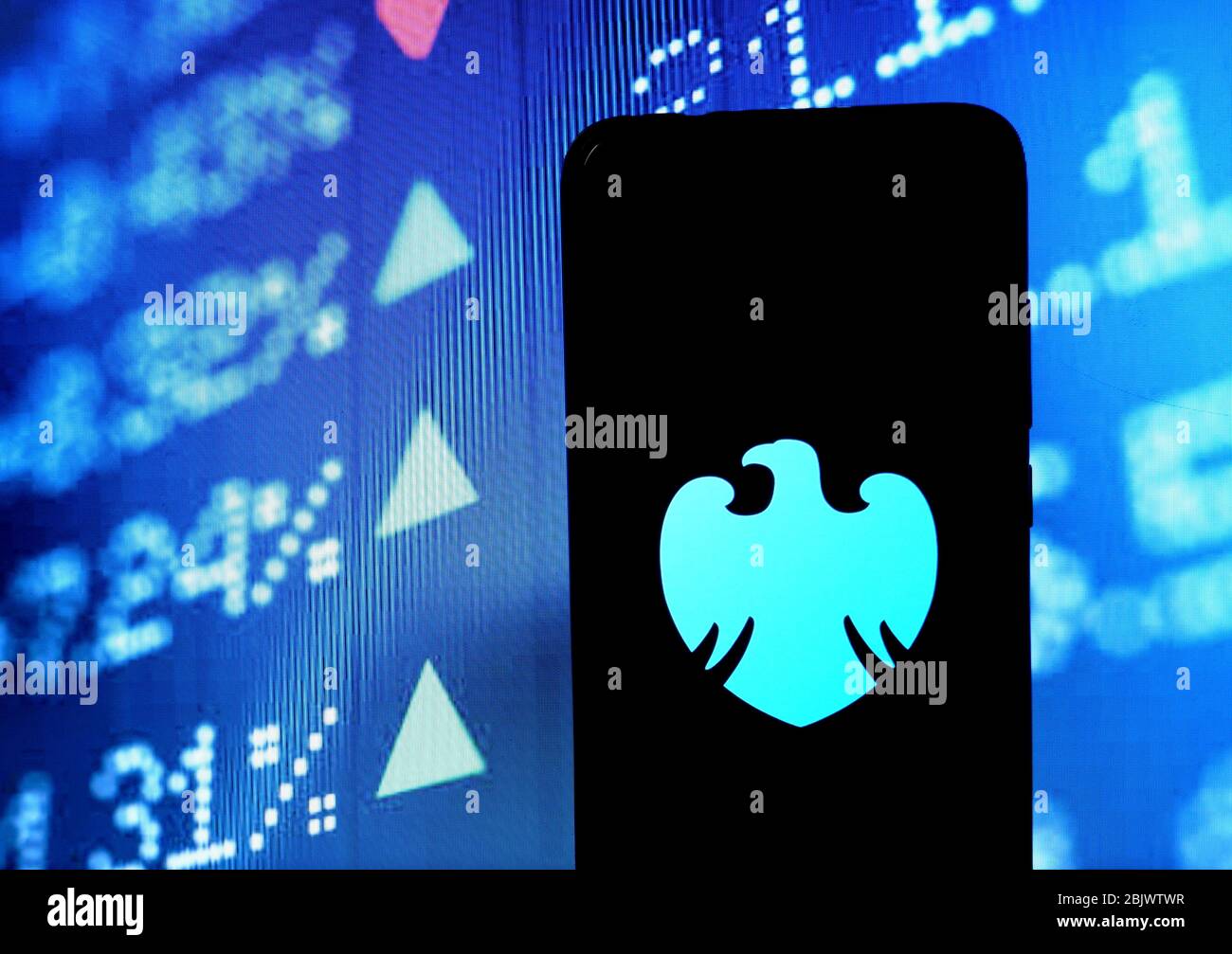 In this photo illustration a Barclays Bank logo seen displayed on a ...