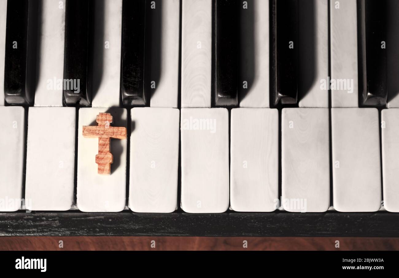 Wooden cross on piano keys, top view Stock Photo - Alamy