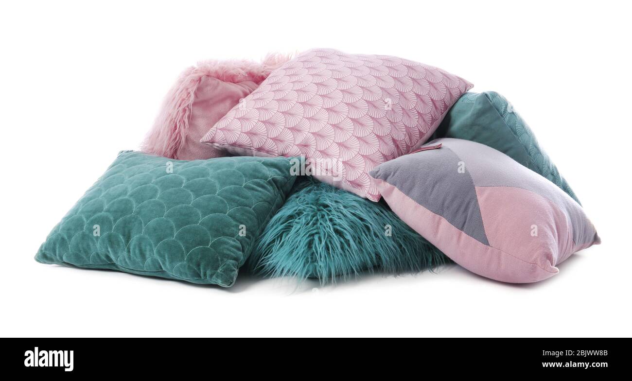 Stylish colorful pillows on white background Stock Photo - Alamy