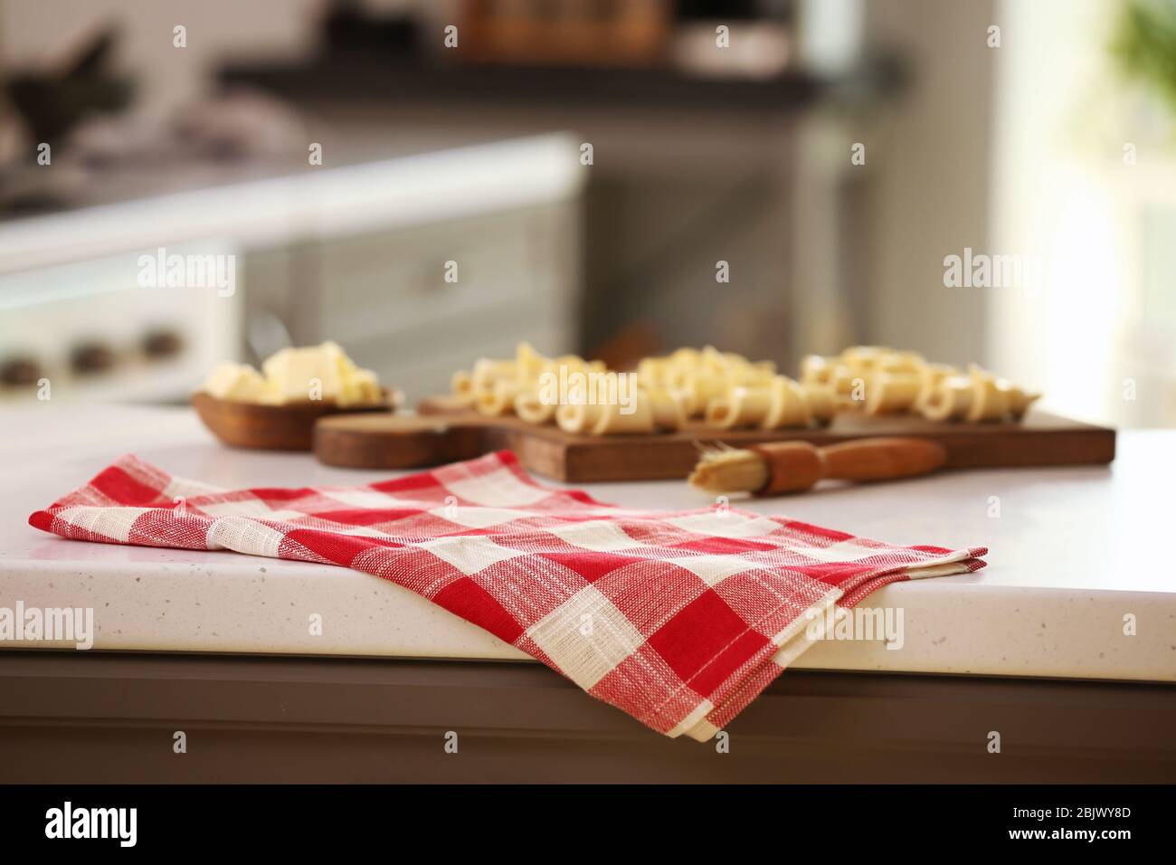 Clean kitchen towel on table Stock Photo - Alamy