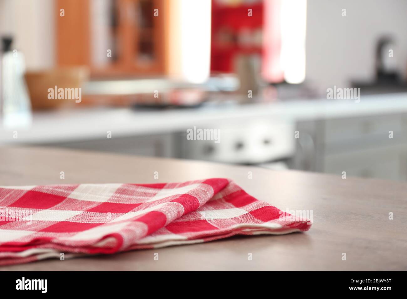 Clean kitchen towel on table Stock Photo - Alamy