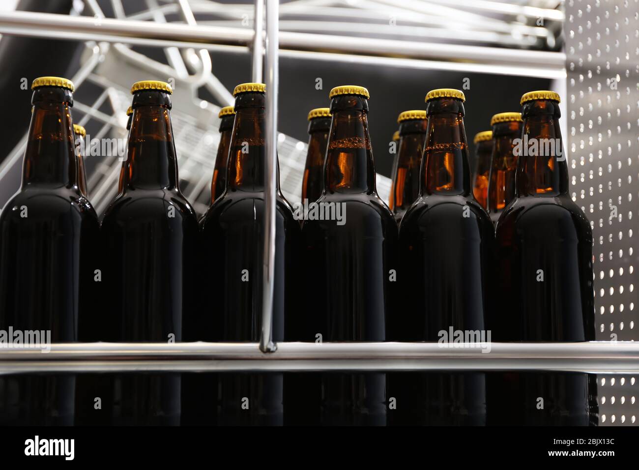 Bottles of beer in brewery Stock Photo - Alamy