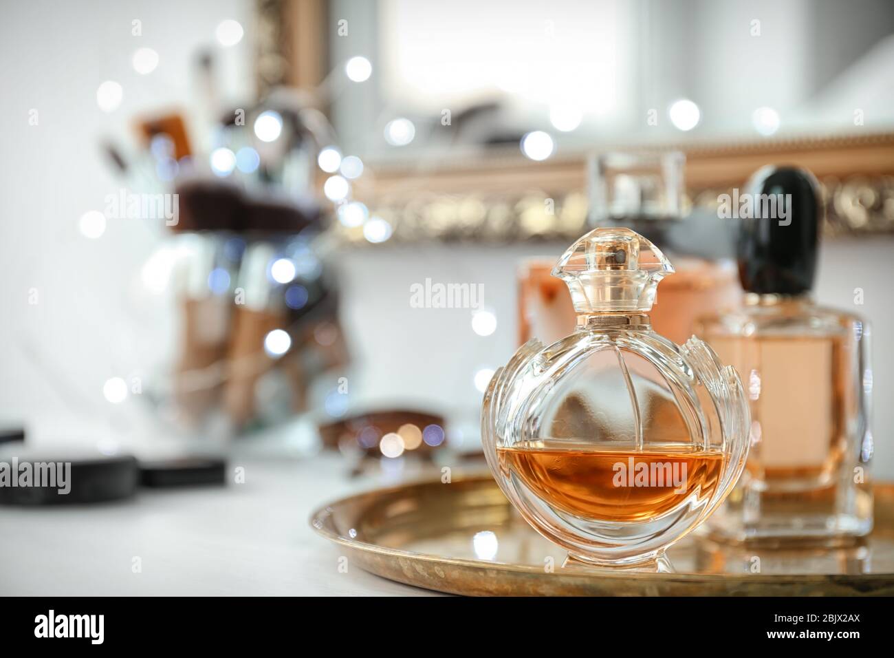 Perfume bottles on tray hi-res stock photography and images - Alamy