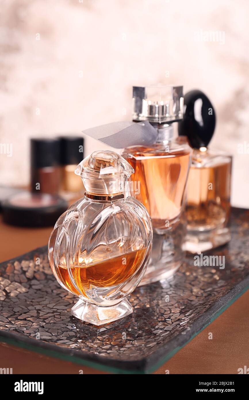 Perfume bottles on tray hi-res stock photography and images - Alamy