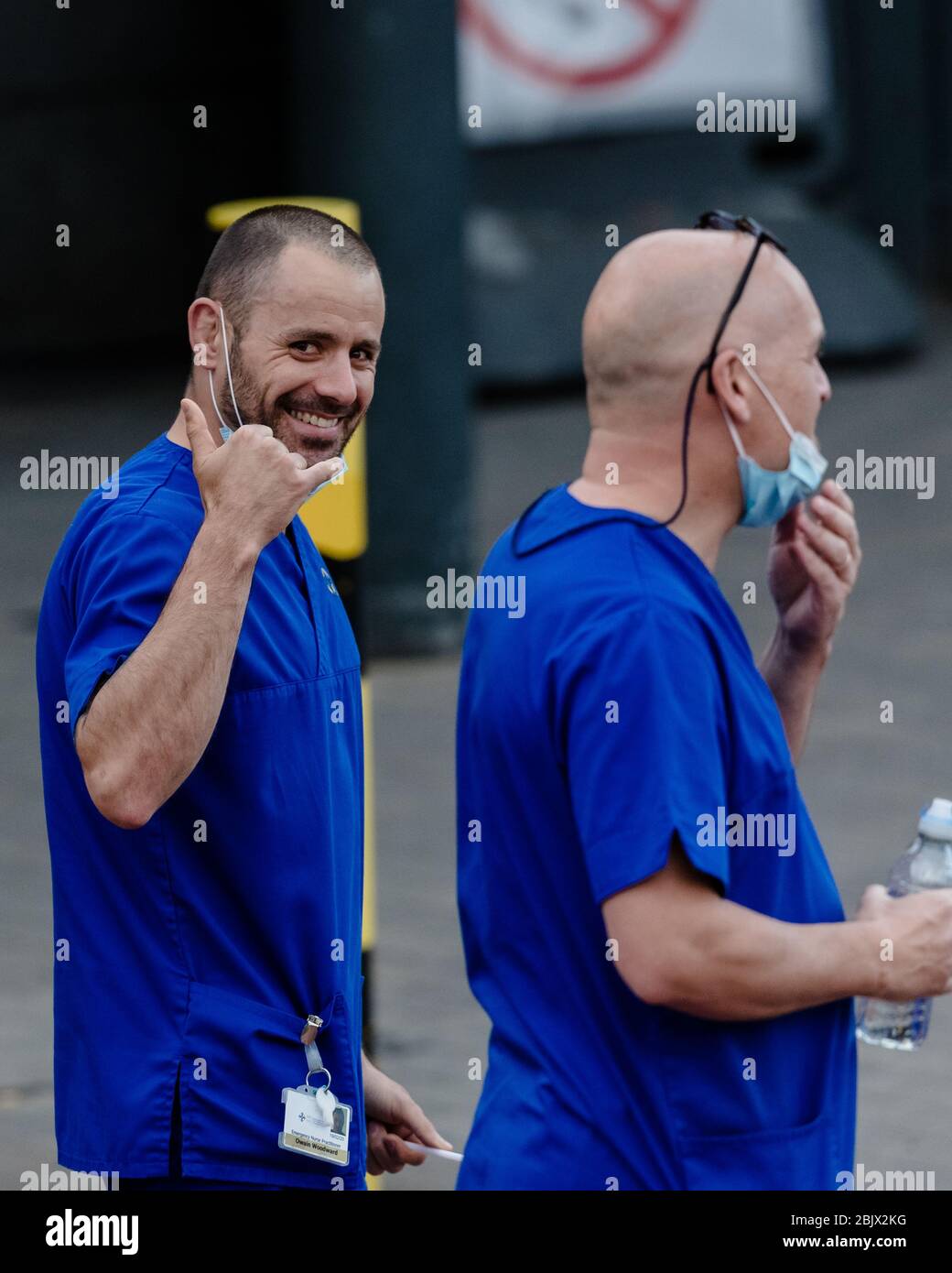 MERTHYR TYDFIL, WALES - 30 APRIL 2020 - NHS staff member smiles as he ...