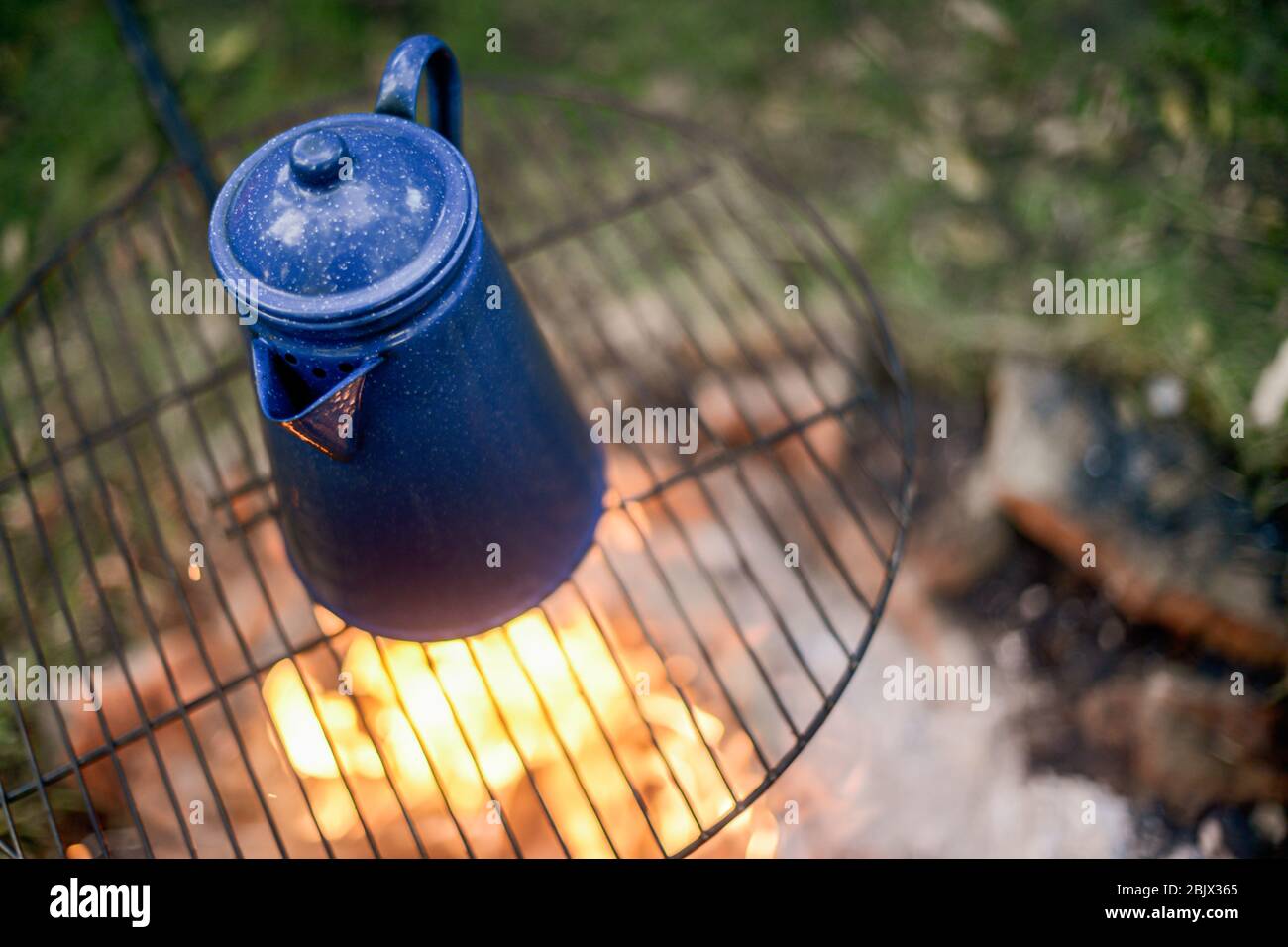 Old pot cooking over campfire hi-res stock photography and images - Alamy