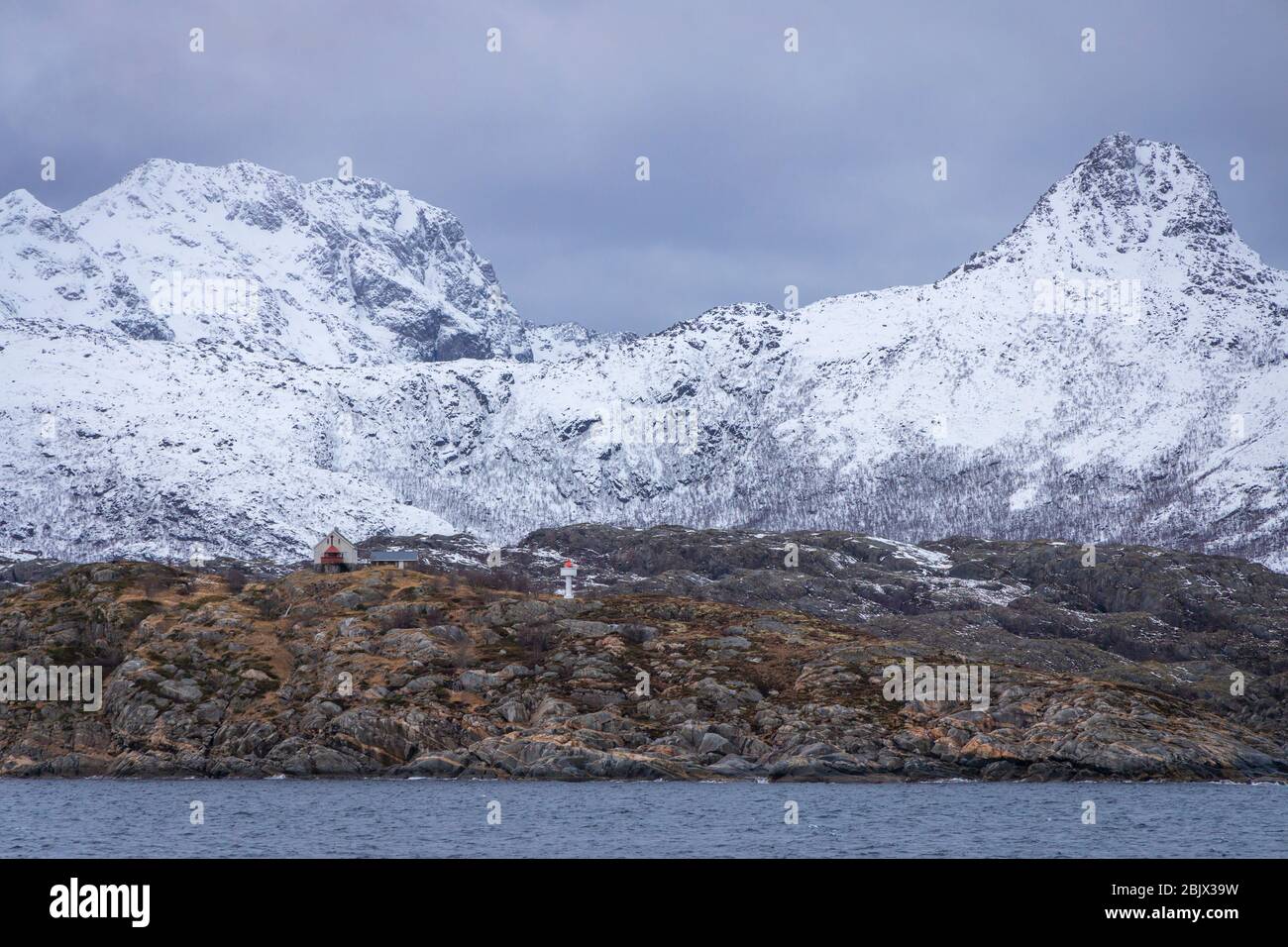 Cruise along the Norwegian coast and the red lighthouse Landegode Fyr ...