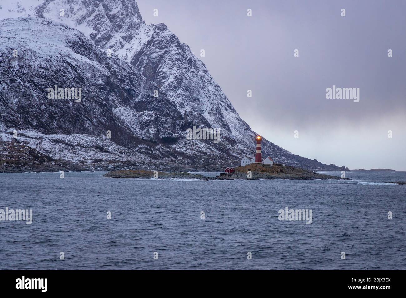 Cruise along the Norwegian coast and the red lighthouse Landegode Fyr ...