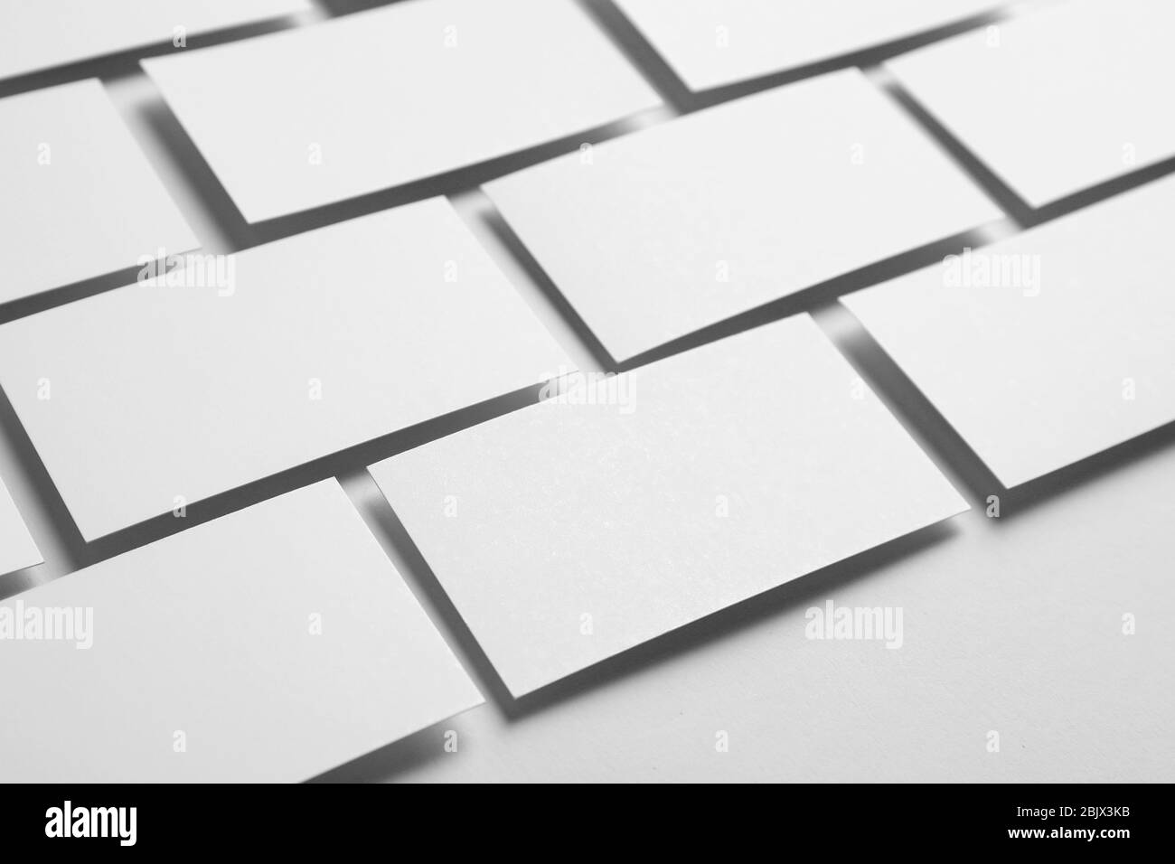 Blank business cards on light background Stock Photo - Alamy