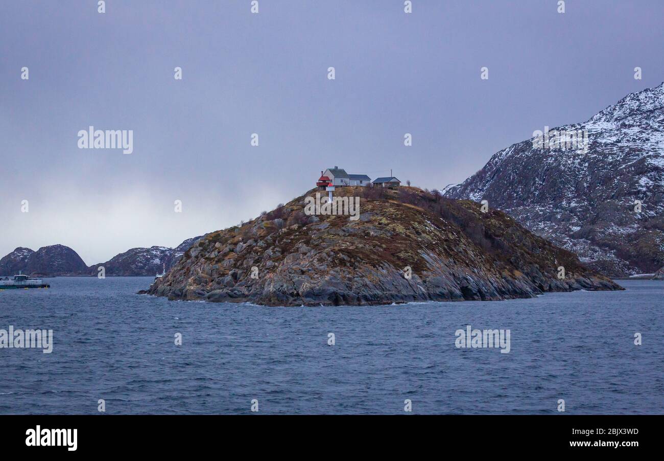 Cruise along the Norwegian coast and the red lighthouse Landegode Fyr ...