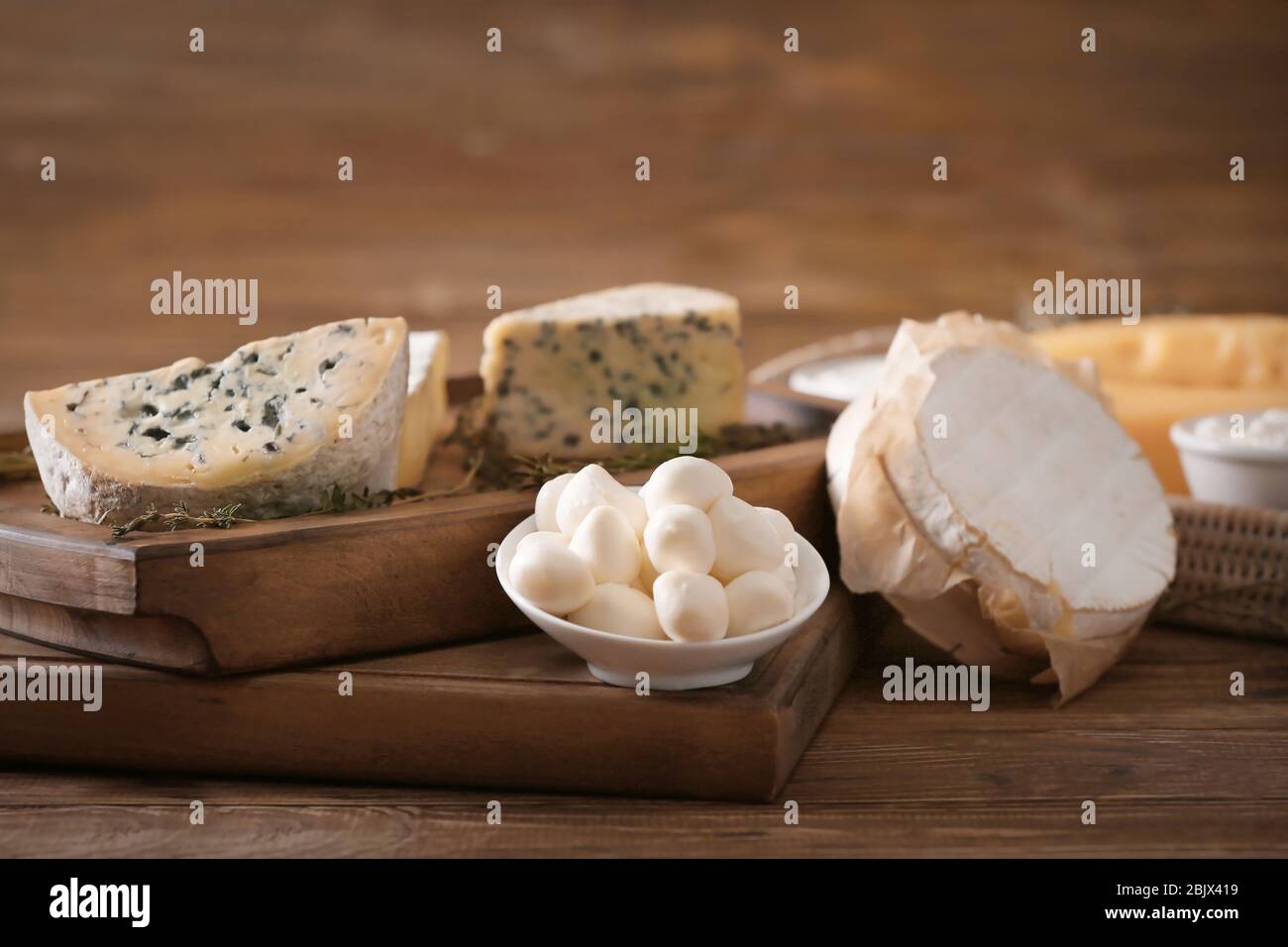 Different cheeses on table. Fresh dairy products Stock Photo - Alamy