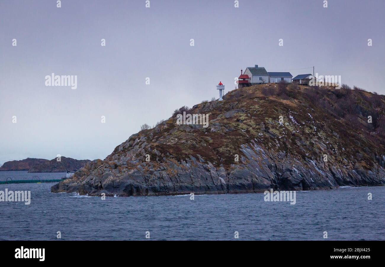 Cruise along the Norwegian coast and the red lighthouse Landegode Fyr ...
