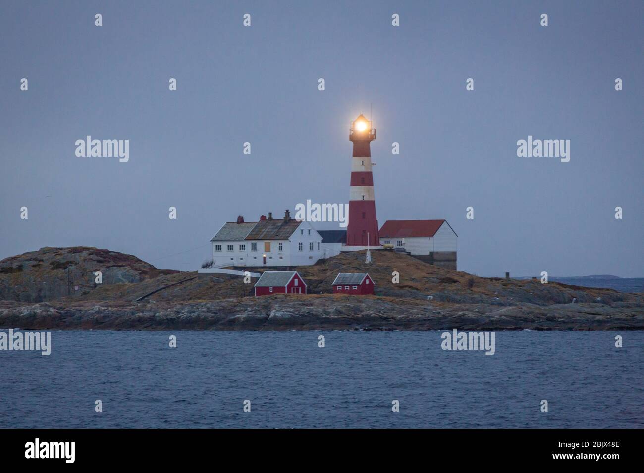 Cruise along the Norwegian coast and the red lighthouse Landegode Fyr ...