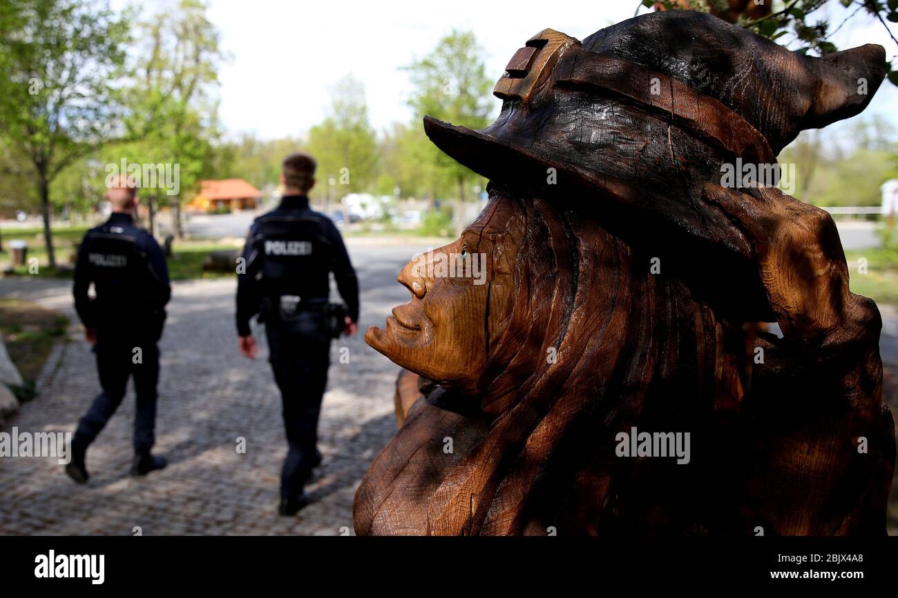 Thale, Germany. 30th Apr, 2020. Police officers patrol the witches ...