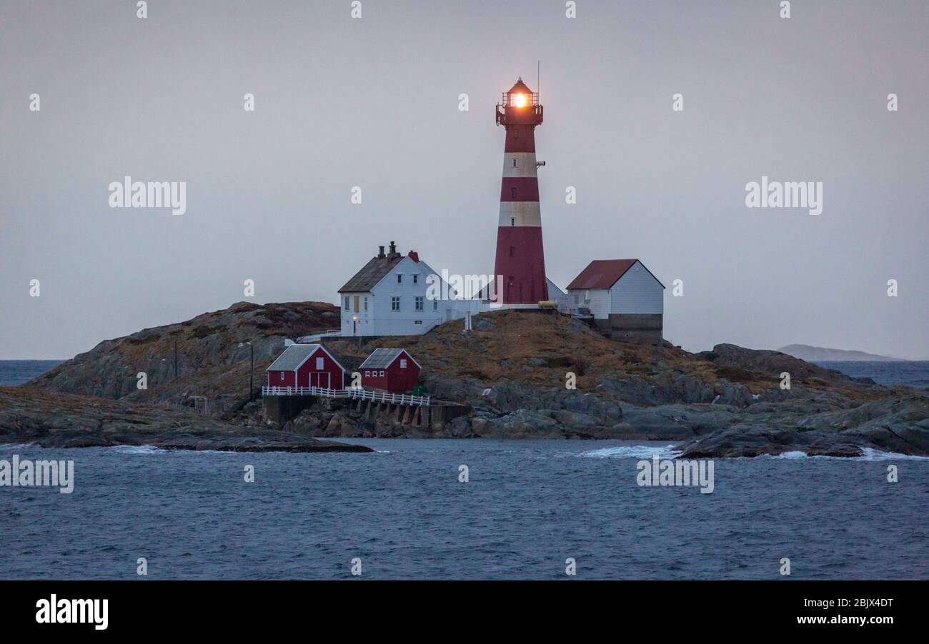Cruise along the Norwegian coast and the red lighthouse Landegode Fyr ...