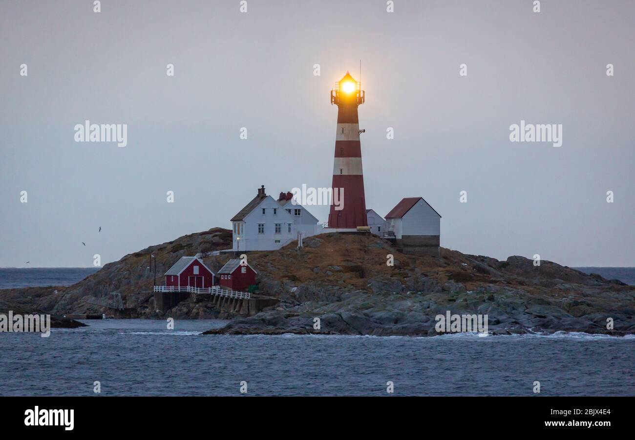 Cruise along the Norwegian coast and the red lighthouse Landegode Fyr ...