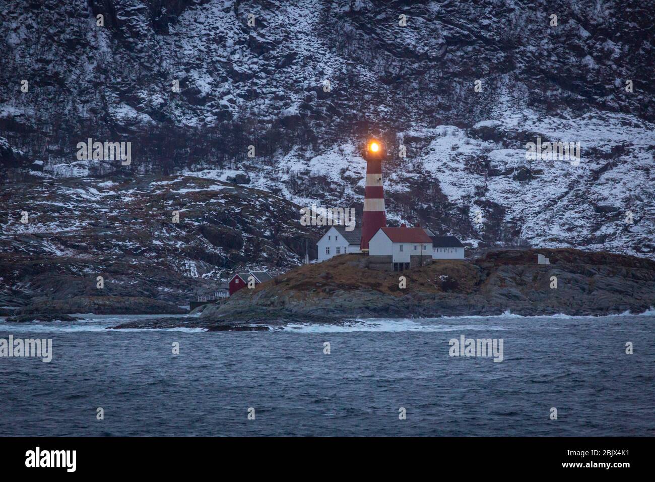 Cruise along the Norwegian coast and the red lighthouse Landegode Fyr ...
