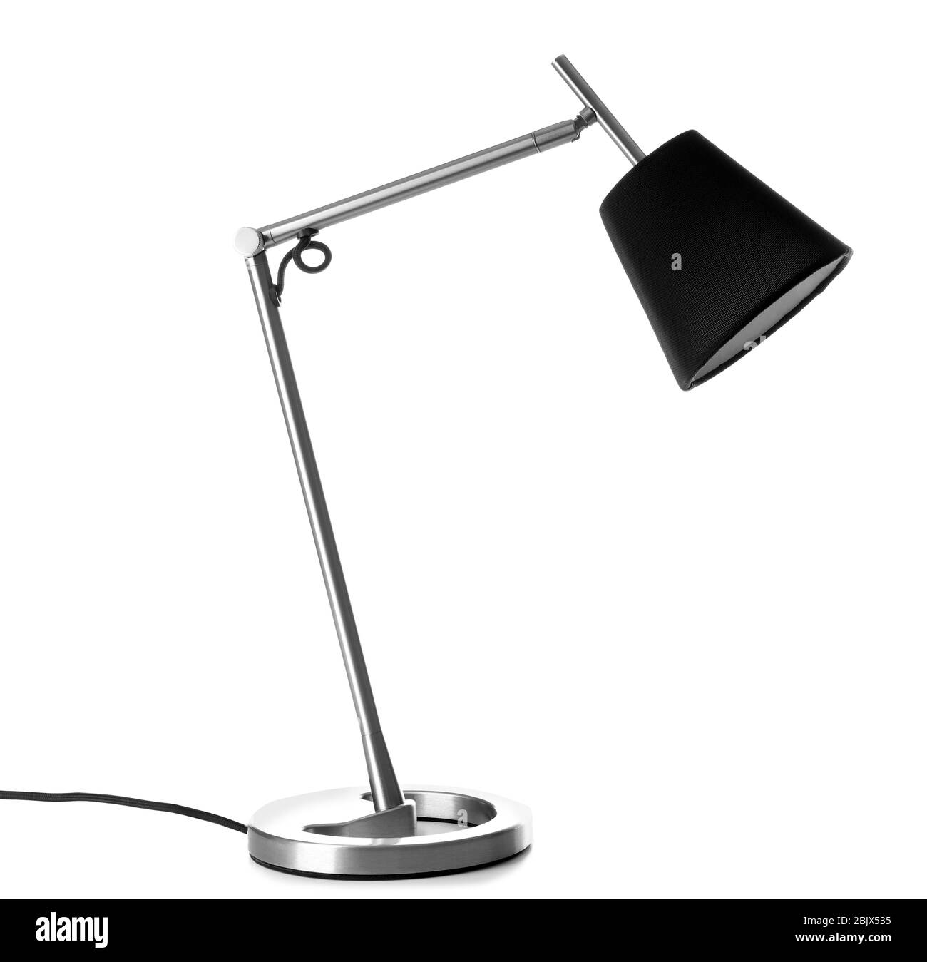 Stylish desk lamp on white background Stock Photo - Alamy