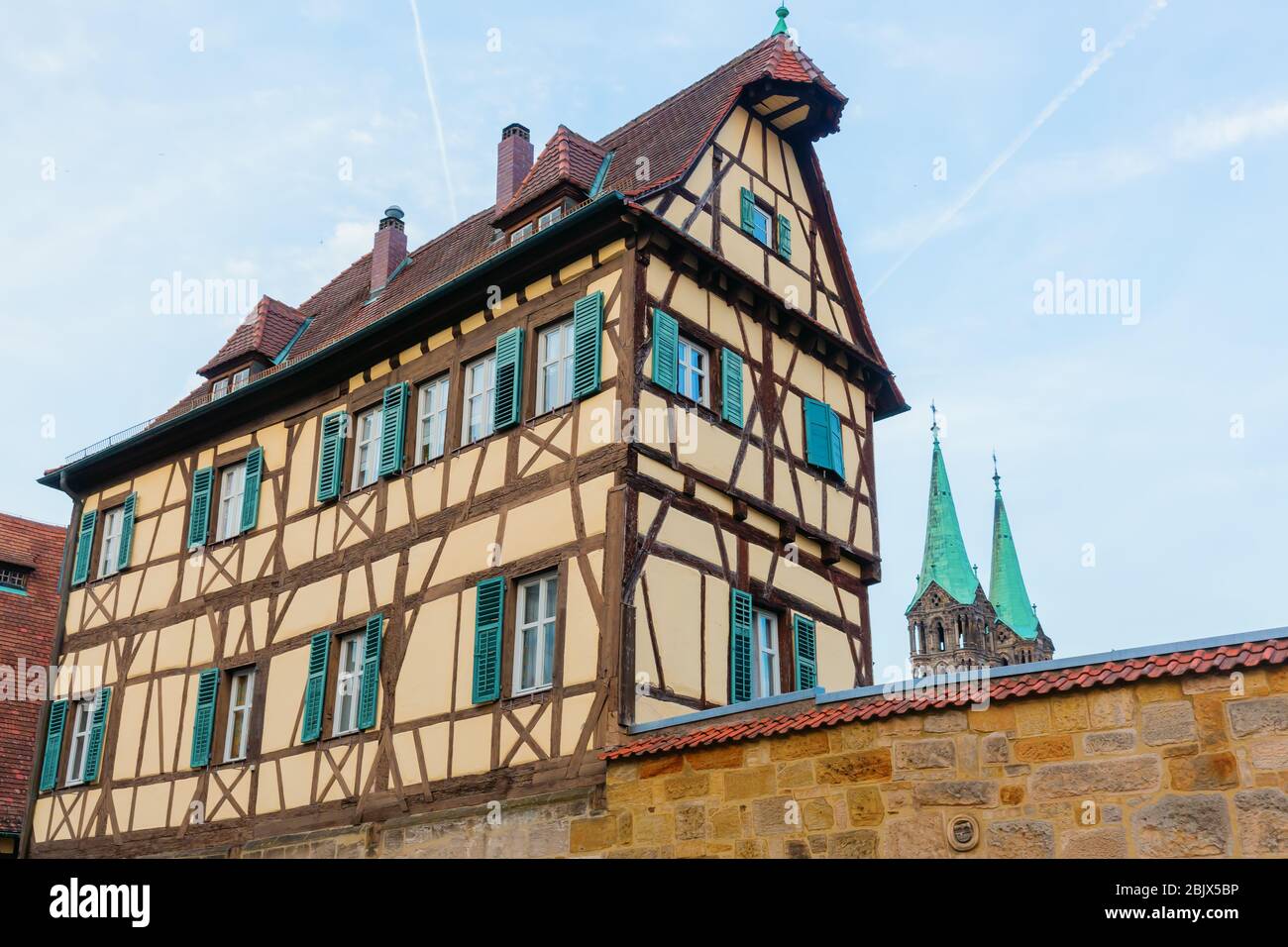 old building with the Bamberg Cathedral in the background, in Bamberg ...