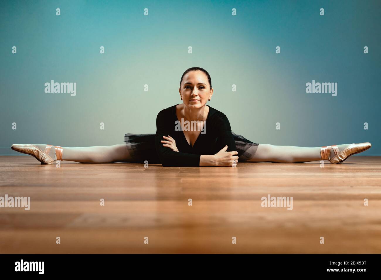 Activity in age, adult female ballet dancer, in great shape posing for ...