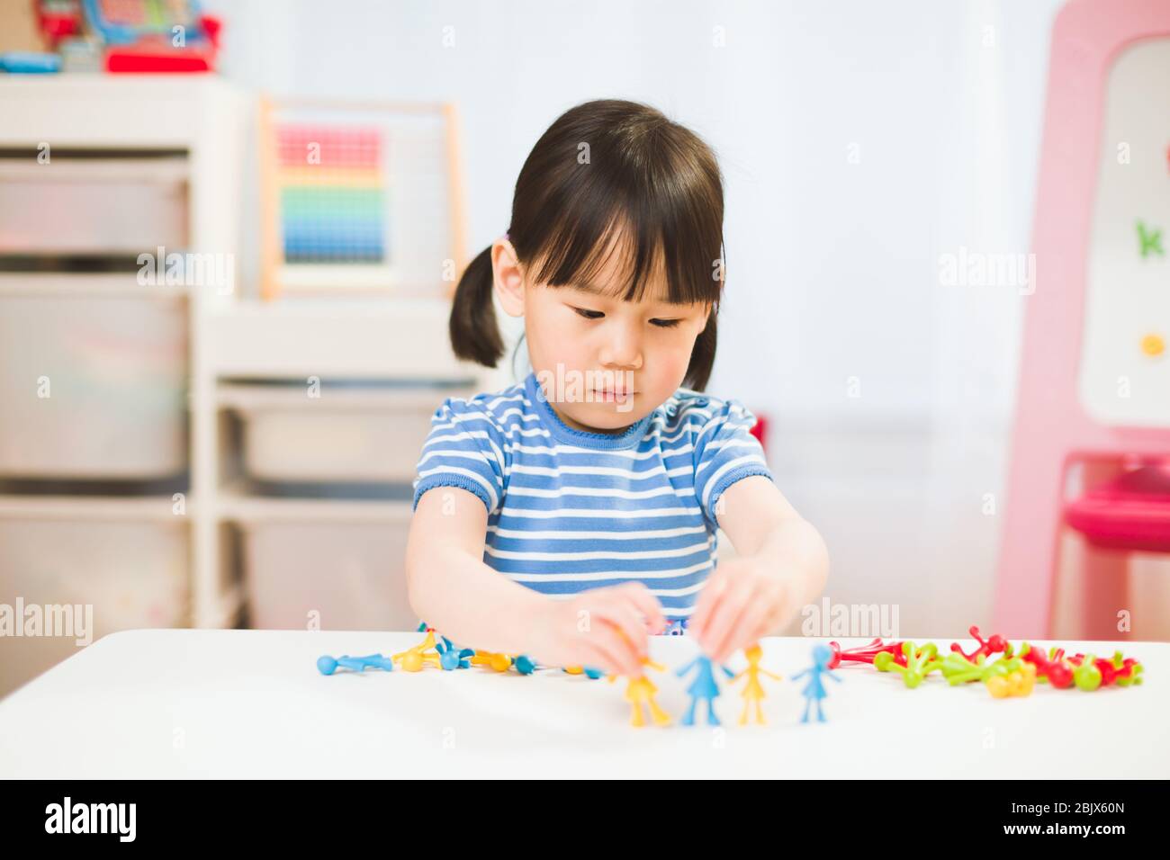 toddler girl learning counting and math for homeschooling Stock Photo ...