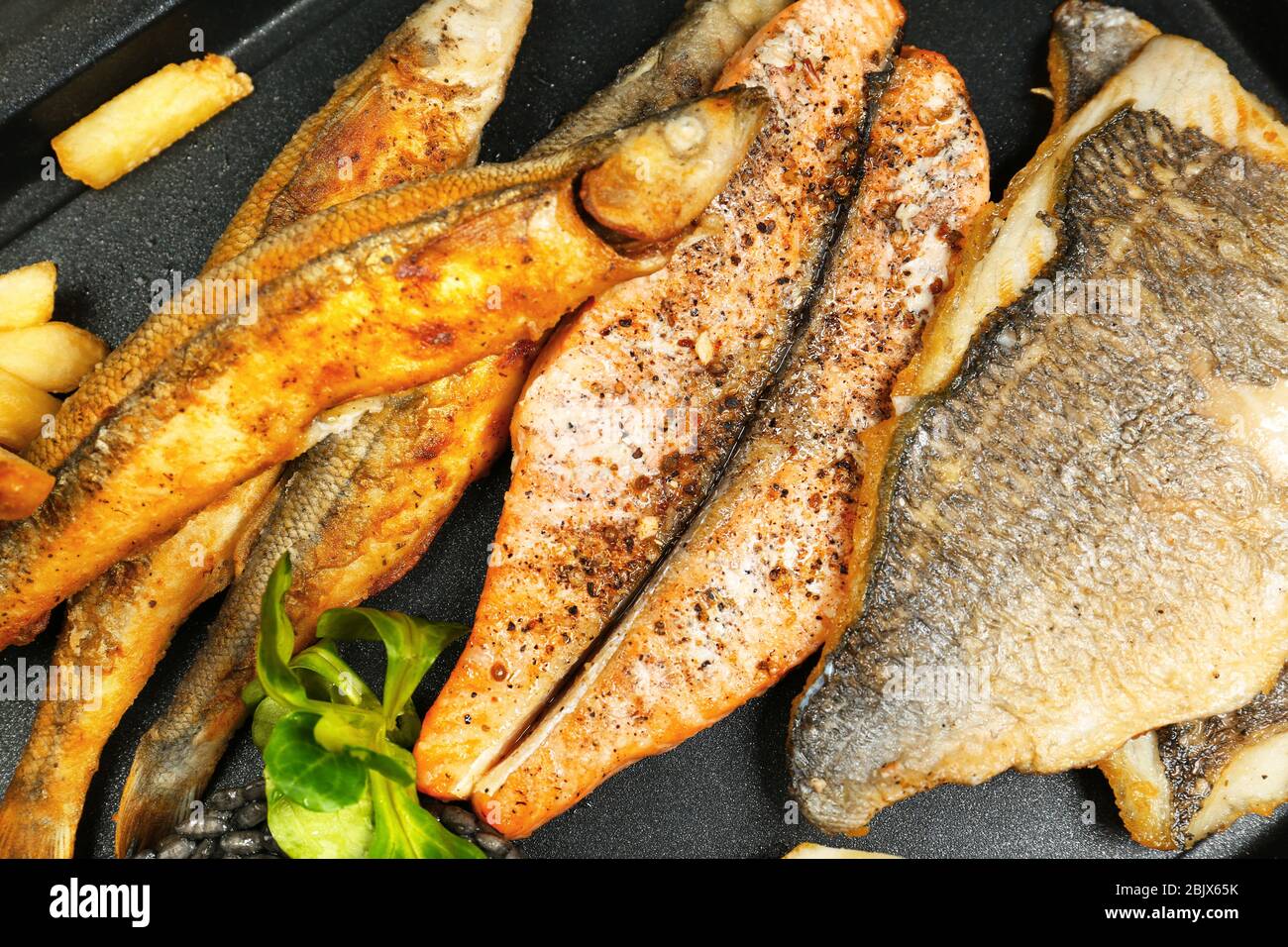Delicious fried fish platter, top view Stock Photo - Alamy