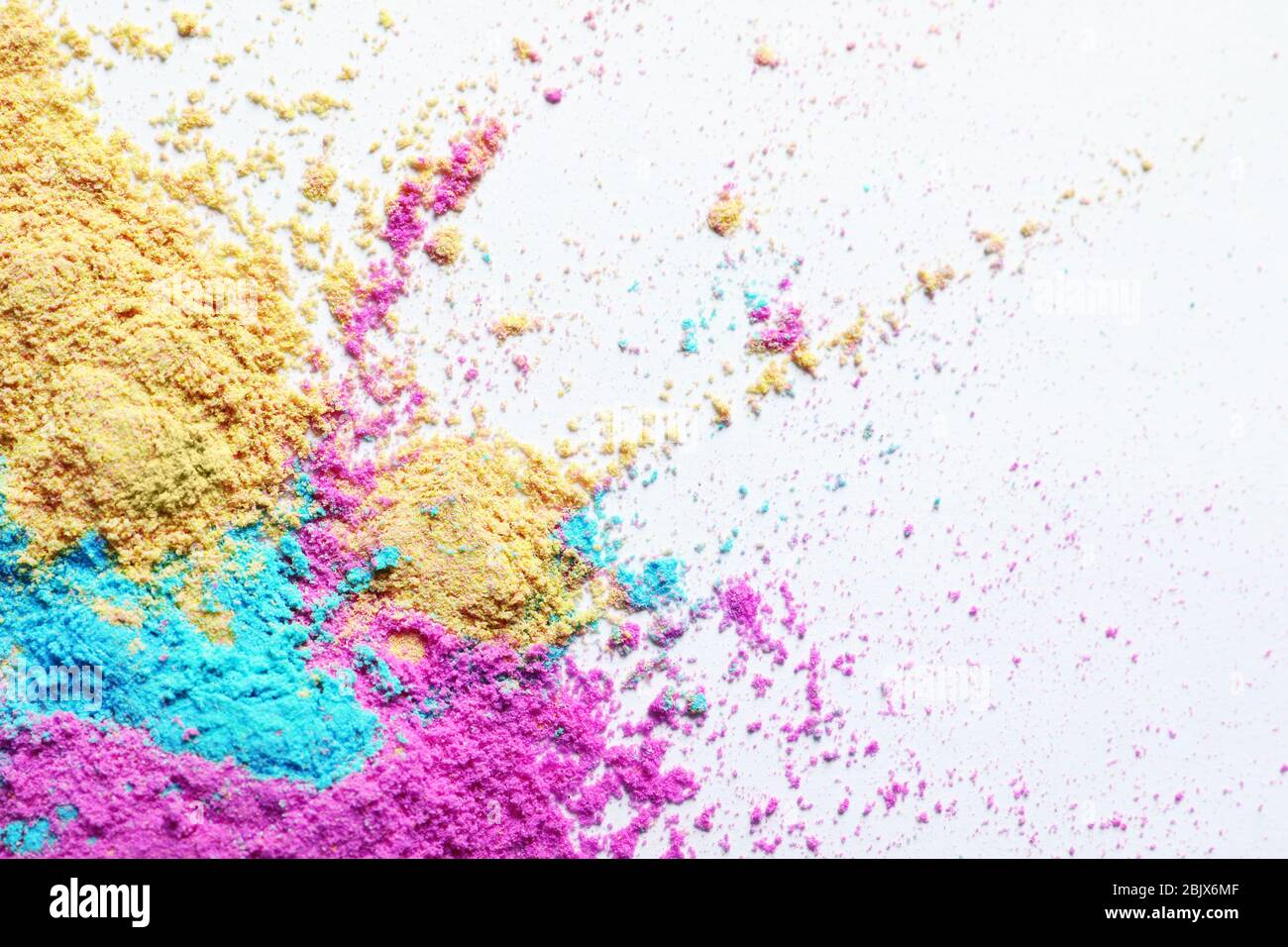 Colorful powders for Holi festival on white background Stock Photo - Alamy