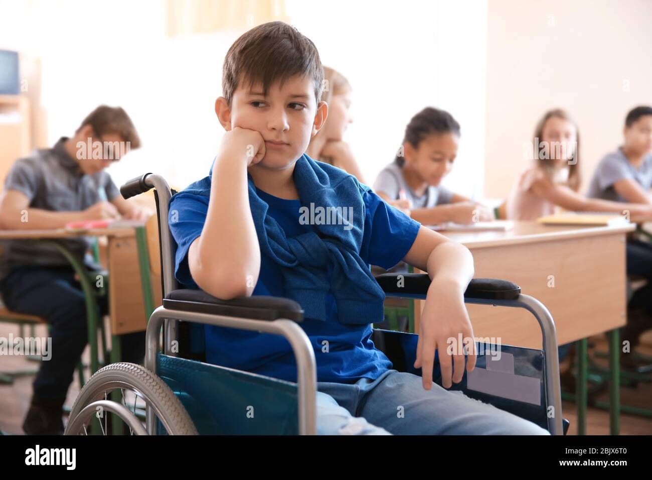 Sad Child In Wheelchair
