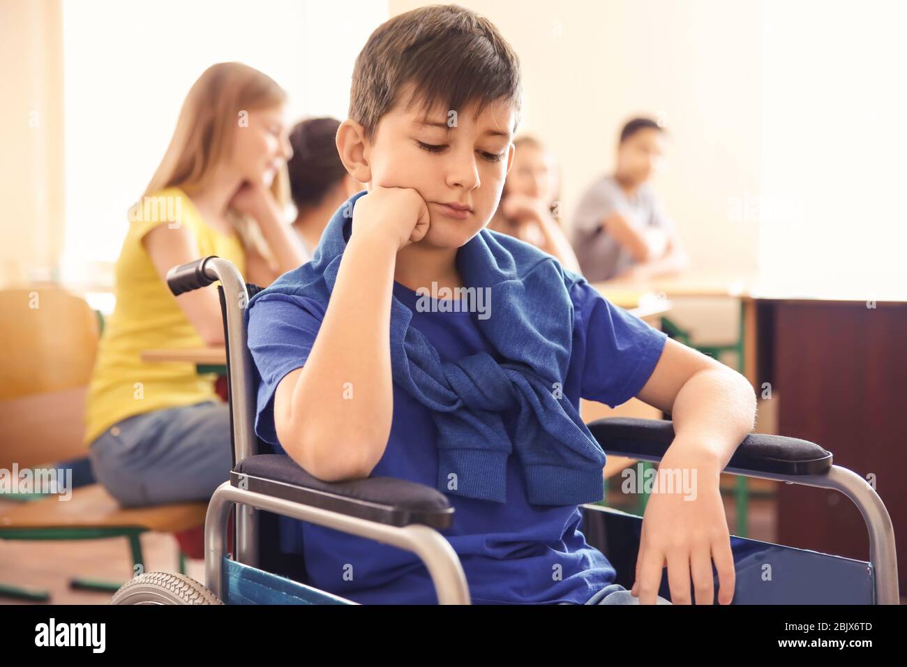 Sad Child In Wheelchair